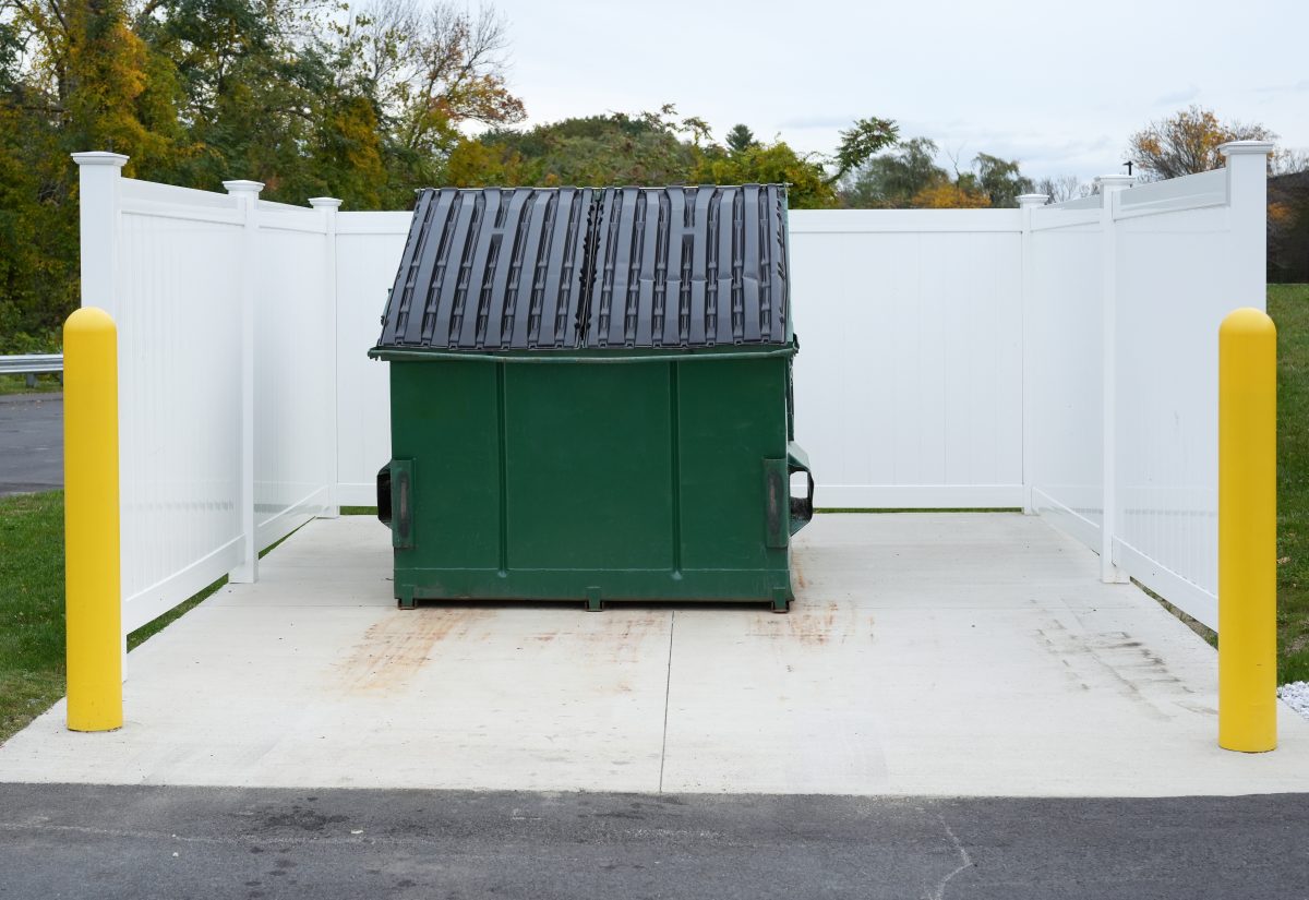 Dumpster pad design: concrete vs asphalt and how to stop rutting